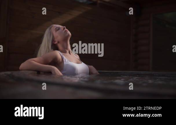 Sexy girl enjoying jacuzzi outdoors. Sexy woman enjoying spa outdoor Stock Video Footage - Alamy