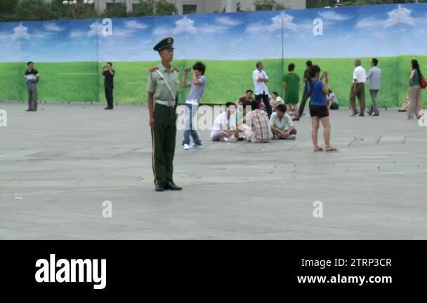 Policeman stands on street city of Tiananmen Square Stock Video Footage ...