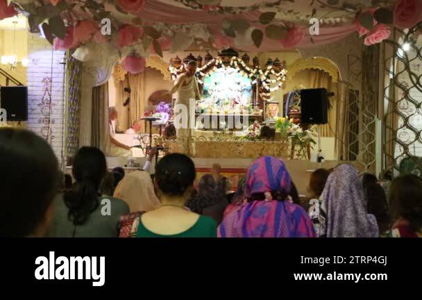 Hare Krishna followers sing mantra in a Temple Stock Video Footage - Alamy