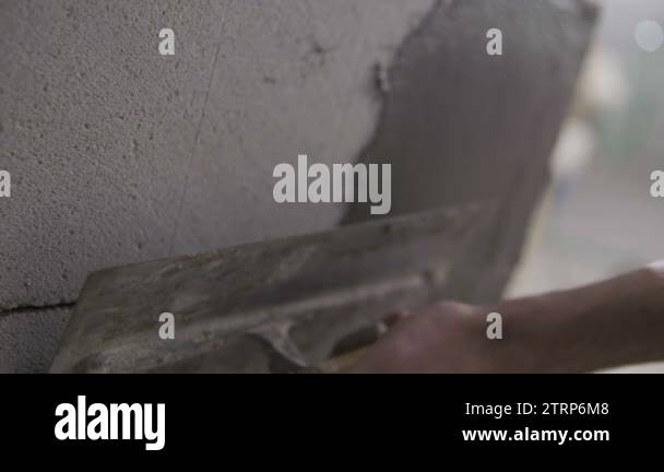 Applying fresh concrete with a float Stock Video Footage - Alamy