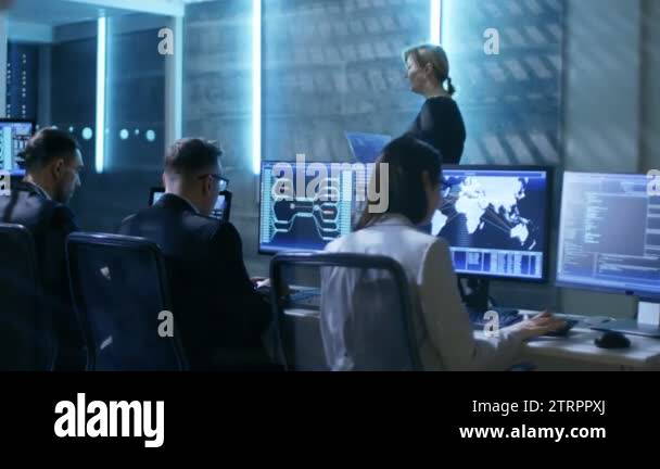 In The Government System Control Center. Female Supervisor with Laptop ...