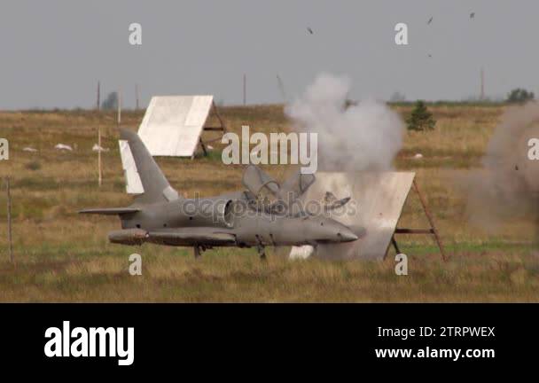 Armed shells falling on a fighter model and hitting the target during ...