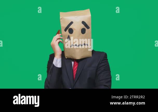 concept of emotion, gestures. a man with a package on his head, with a ...