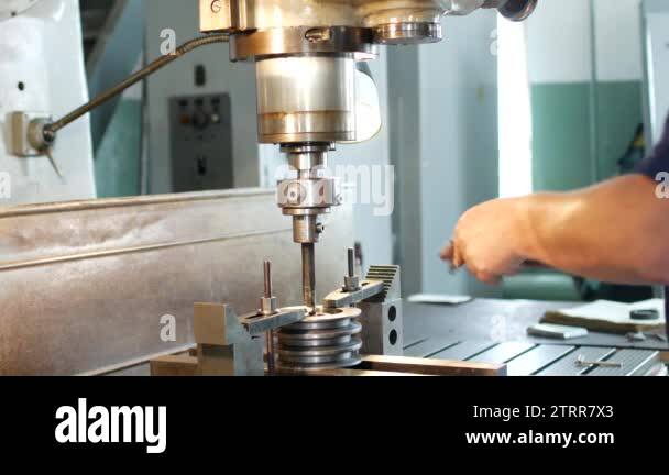 The man specialist checks the measuring tool with the size of drilling ...