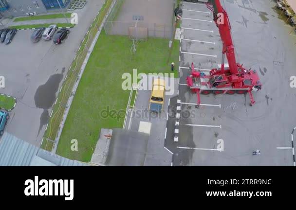 Fire-crane standing near tower on territory of fire station Stock Video ...