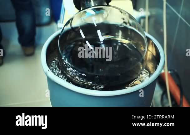 Rotating flasks, vessel test tubes with liquid organic chemical science ...