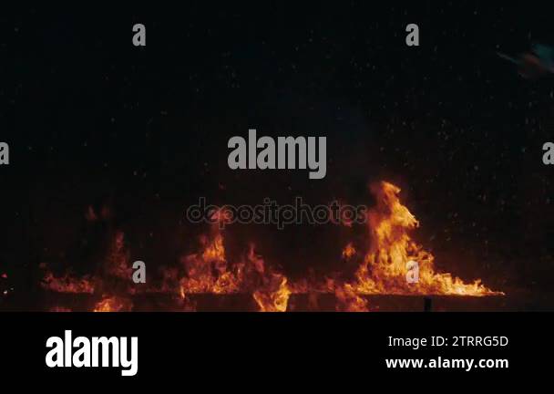 Flying doves over fire flames. Fire flames on dark background Stock ...