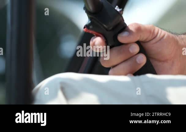 Male hand controlled helicopter, close up. The helicopter pilot holding ...