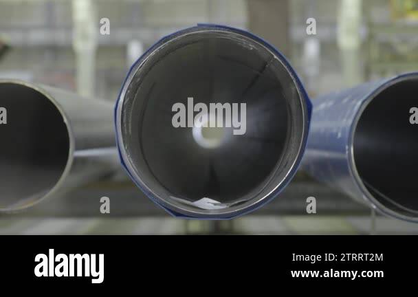 Working with Crane over head in Steel warehouse. Pipe lift on overhead ...