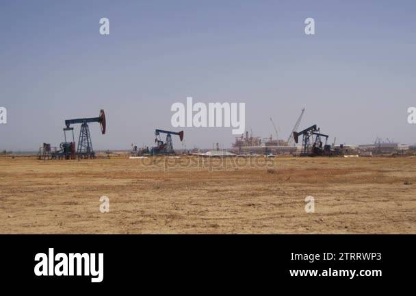 Oil Pumps. Extraction of Oil Pumping Station Stock Video Footage - Alamy