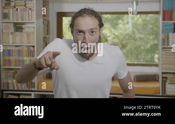 Omg reaction of a excited amazed young man pointing index finger at ...