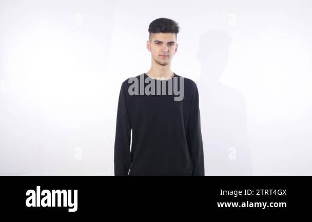 Closeup portrait of funny young man puckering lips, with look of ...