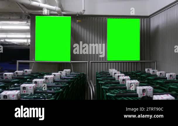 Row of empty shopping carts in front of buy low foods supermarket with ...