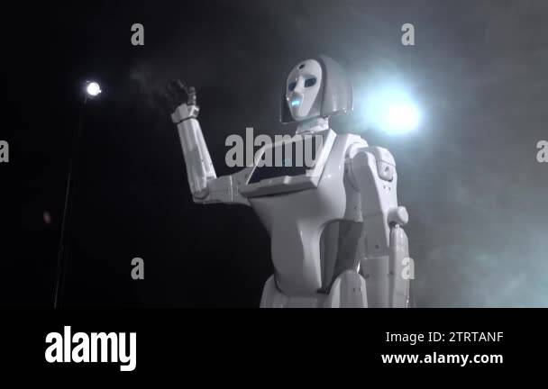 Robot hand waving goodbye . Black smoke background Stock Video Footage ...