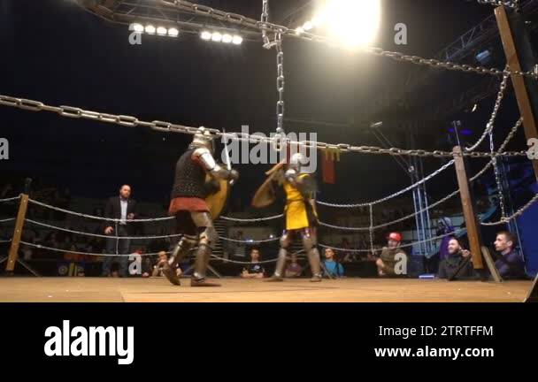 Two Medieval Knight Fighting In An Arena With Swords And Shields. Slow ...