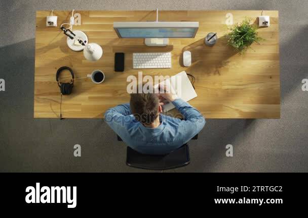 Top View of Creative Worker Filling Work Related Notebook while Working ...