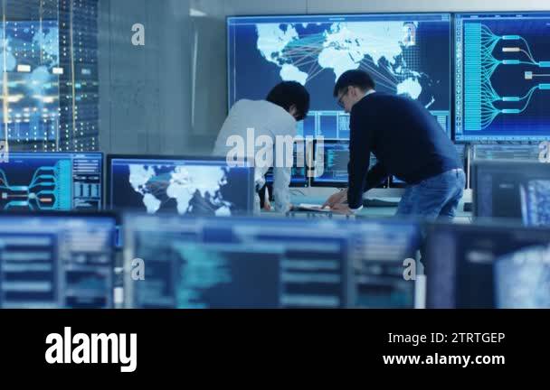 In the System Control Room Project Manage and IT Engineer Have ...