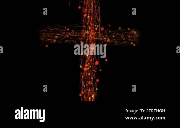 christian religious cross on a black background and illuminating dusty ...