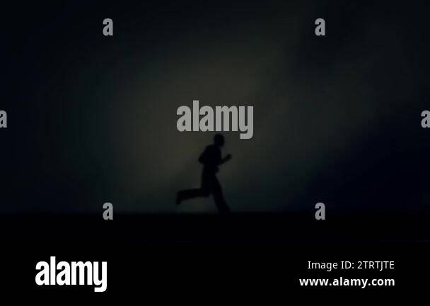 Man Running Fast Under a Lightning Storm and Rain at Night - Loop Stock ...