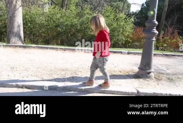 Curb child Stock Videos & Footage - HD and 4K Video Clips - Alamy