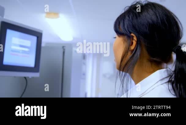 Laboratory technician using a display monitor in blood bank 4k Stock ...