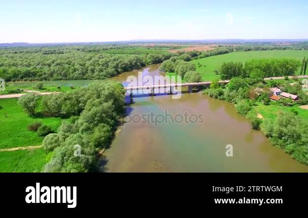 Two rivers of different colors of water merge into one large river ...