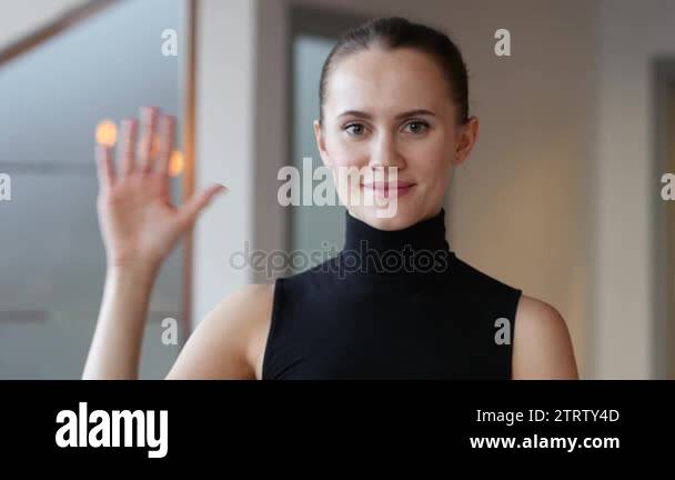 Woman waving hand Stock Videos & Footage - HD and 4K Video Clips - Alamy