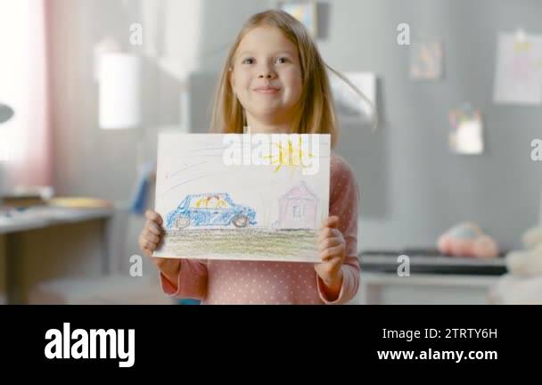 Cute Little Girl in Her Room Shows Drawing of Her Family in a Car Stock ...