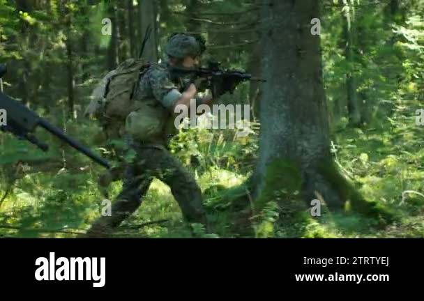 Squad of Five Fully Equipped Soldiers in Camouflage on a Reconnaissance ...