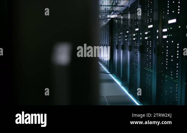 Female Server Engineer In Data Center Works on Rack Server with Her ...