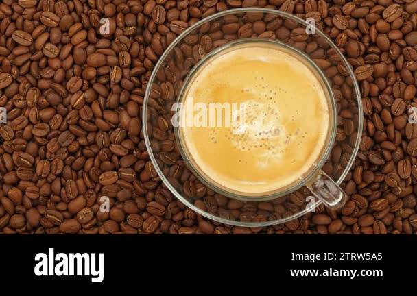 Close up one glass cup full of latte coffee with milk on transparent ...
