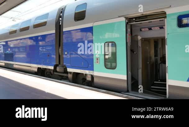 LYON, FRANCE - CIRCA 2016: Pedestrians commuters walking toward TGV ...