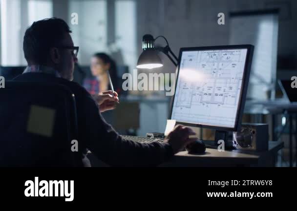 Late at Night in the Office. Design Engineer Works on His Personal ...