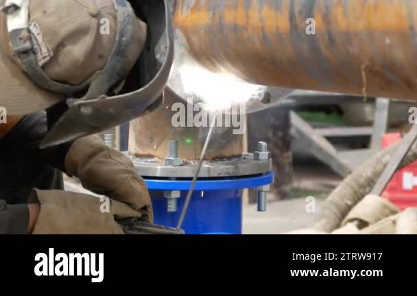 Welding pipe. Welder worker welding pipe by electrode. Electrodes for ...