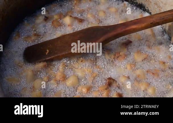 Making greaves from pork fat, Pork greaves preparation, Cooking greaves ...