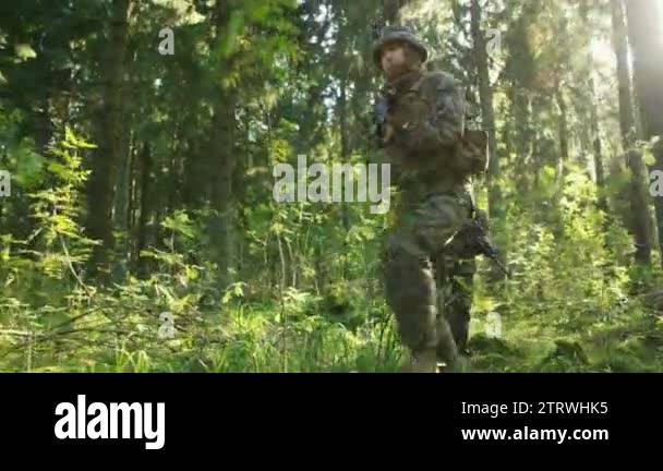 Squad of Five Fully Equipped Soldiers on a Reconnaissance Military ...