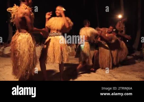 Indigenous Fijian men dancing the traditional meke wesi male dance ...