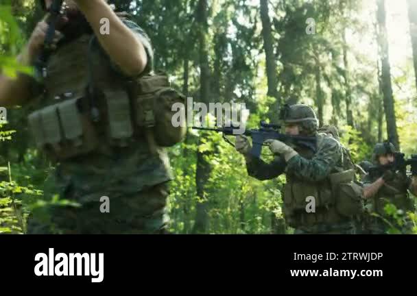 Squad of Five Fully Equipped Soldiers in Camouflage on a Reconnaissance ...