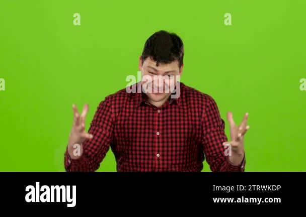 Aggressive man, he is angry at all and can not be stopped. Green screen ...