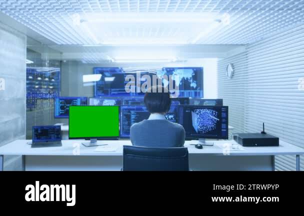 Back View of the IT Technician Working on with Neural Network on His ...