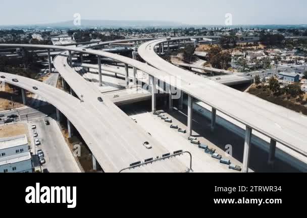 Drone flying right around incredible highway junction interchange in ...