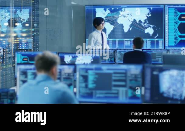 In the System Control Room Manager Holds a Briefing for His Staff ...