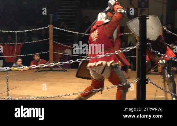 Two Medieval Knight Fighting In An Arena With Swords And Shields. Slow ...