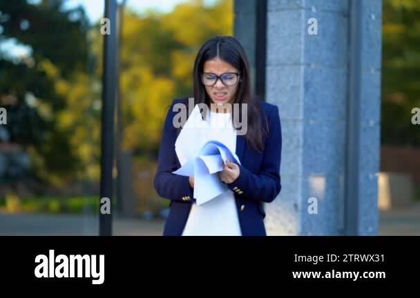 Angry furious female office worker throwing crumpled paper, having ...