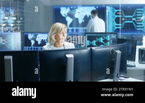 System Monitoring Room Professional Female Operator Observes Correct ...