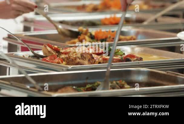 People group catering buffet food indoor in luxury restaurant with meat ...