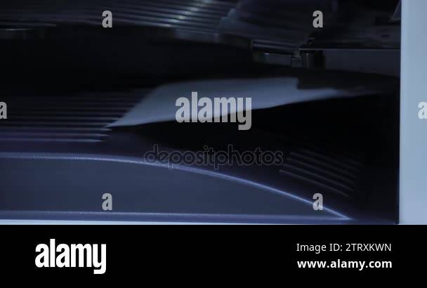 Man hands putting a sheet of paper into a copying device. Printer In ...