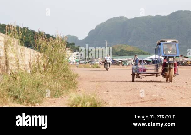 people walking and riding motorbike traffic jam center town in ...