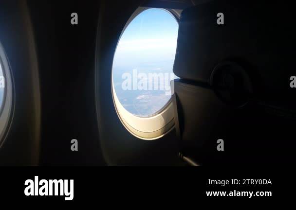 Airplane seat and window inside an aircraft Stock Video Footage - Alamy