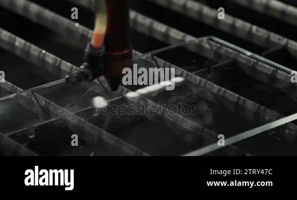 Laser cnc machine engraving design pattern on transparent acryl plate ...